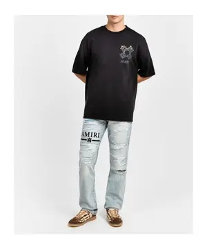Amiri Distressed Light Wash Straight Leg Jeans