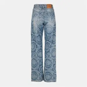 Versace Wide-leg Jeans With Branded Hardware