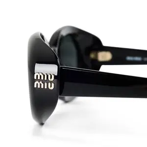 Miu Miu Oval Sunglasses