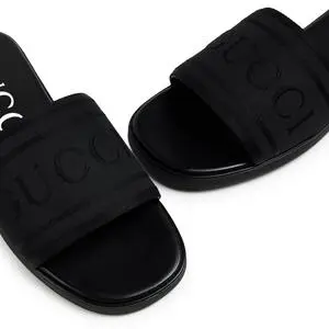 Gucci Flat Slip-on Sandals With Embossed Logo