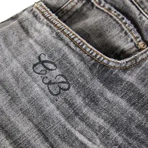Balenciaga Wide Leg Jeans With Embroidered Details