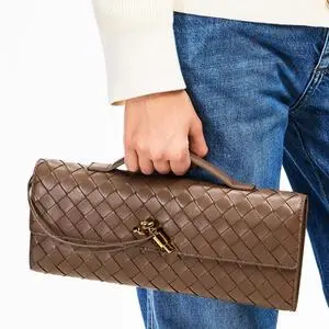 Bottega Veneta Woven Sheepskin Clutch With Top Handle - Brown