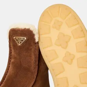 Prada Shearling-lined Suede Ankle Boots