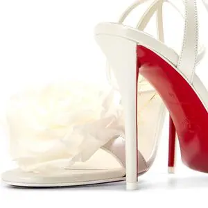 CHRISTIAN LOUBOUTIN Strappy Heeled Sandals With Floral Embellishment