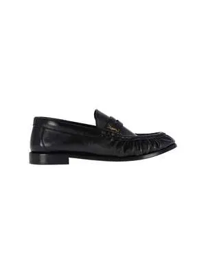 Saint Laurent Leather Loafers With Fringe Detailing