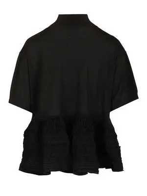 Alaïa Cryoline Wool Peplum Top With High Neck And Ruffled Hem - Black