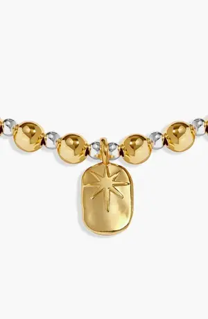 A LITTLES & CO Be Happy' Beaded Bracelet With Charm And Embroidered Pouch