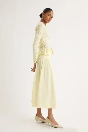 Merlette Arena Ruched Peplum Top With Drawcord Sleeves