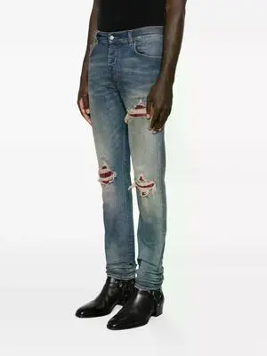 Amiri Distressed Patchwork Jeans