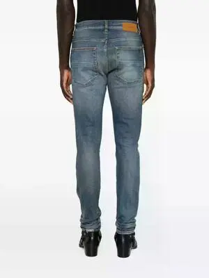 Amiri Distressed Patchwork Jeans