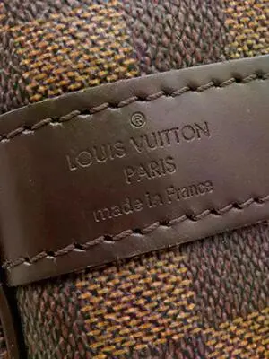 LOUIS VUITTON Damier Ebene Keepall Bandouliere 55 Travel Bag - Brown