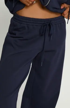Princess Polly Summits Mid Rise Flare Track Pants