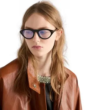Prada Sunglasses With The Iconic Metal Plaque