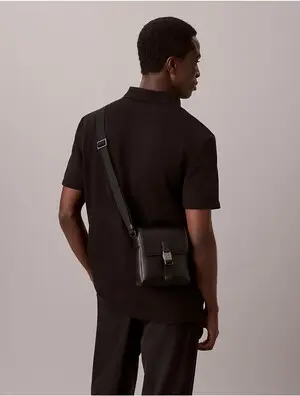 Calvin Klein Emblem Logo Hardware Flap Reporter Bag