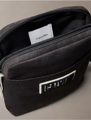 Calvin Klein Bold Logo Graphic Reporter Bag