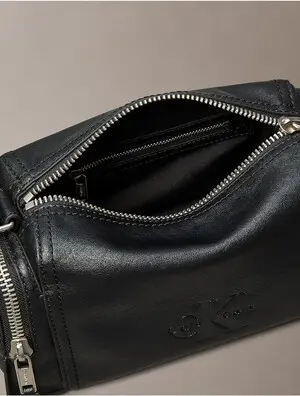 Calvin Klein Embossed Monologo Zip Flight Bag