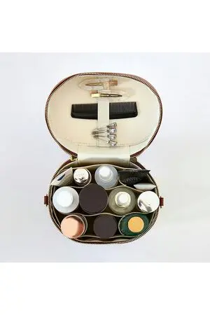 ETOILE COLLECTIVE Oval Toiletry Case In Brown