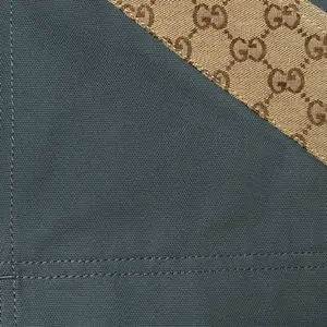 Gucci Cargo Monogrammed Shorts