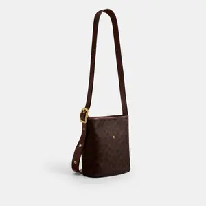 COACH OUTLET Coach Signature Canvas Bleecker Bucket Bag 21
