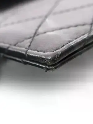 Saint Laurent Quilted Leather Clutch Bag