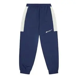 NEW BALANCE Woven Track Pants Asia Sizing - Navy