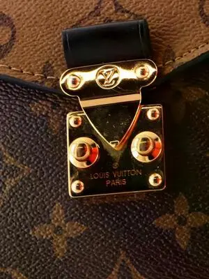 LOUIS VUITTON Pochette Metis Reverse Monogram Canvas Crossbody Bag