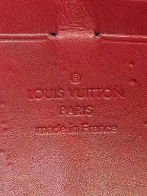 LOUIS VUITTON 2009 Le Favori Suhali Leather Wallet
