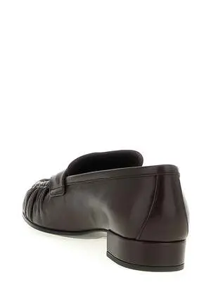 Prada Curled Toe Moccasins