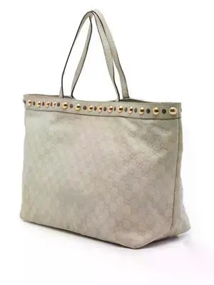 Gucci Monogram Embossed Leather Tote Bag