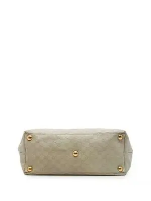 Gucci Monogram Embossed Leather Tote Bag