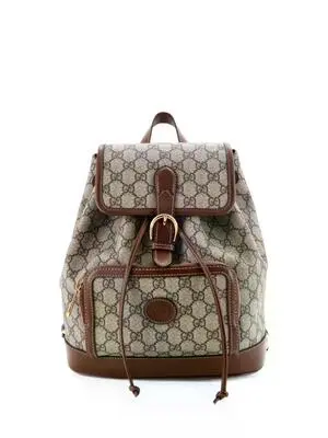Gucci Interlocking G Patch Drawstring Flap Gg Coated Canvas Backpack