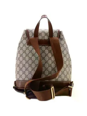 Gucci Interlocking G Patch Drawstring Flap Gg Coated Canvas Backpack