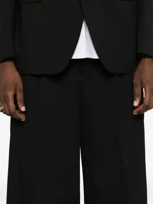 Comme Des Garçons Satin-panelled Pleated Trousers