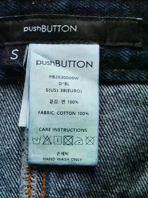 PUSHBUTTON Asymmetric-front Denim Mini Skirt