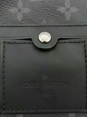 LOUIS VUITTON Monogram Eclipse Voyager Pm Cross Body Bag