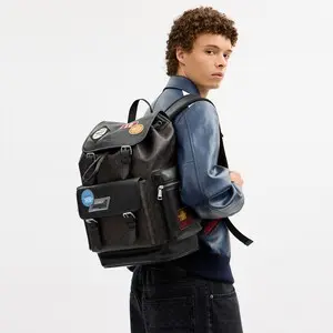 COACH OUTLET Coach Signature Canvas Backpack With Patches - Silver/walnut/black