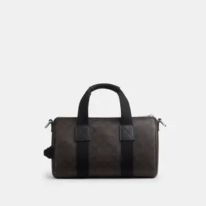 COACH OUTLET Explorer Duffle Bag 28 In Signature Canvas With Patches