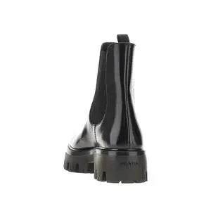 Prada Spazzolato Leather Chelsea Boots