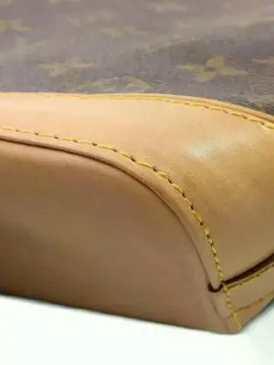 LOUIS VUITTON 2006 Lockit Monogram Handbag