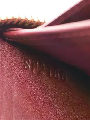 LOUIS VUITTON 2010 Zippy Monogram Vernis Wallet Red
