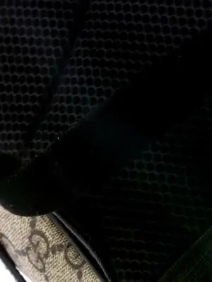 Gucci Gg Coated Canvas Backpack