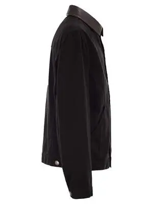 Brunello Cucinelli Lightweight Garment-dyed Cotton Denim Jacket With Leather Collar - Black