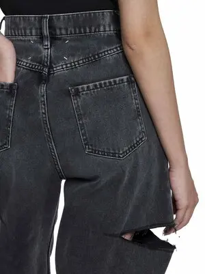MAISON MARGIELA Black 'cut' Jeans By