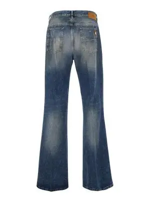 Amiri Blue Jeans With Front Rips And Logo Patch On The Back