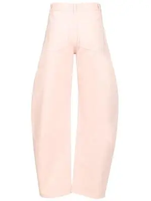 Alaïa Curved Dyed Denim Jeans