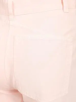 Alaïa Curved Dyed Denim Jeans