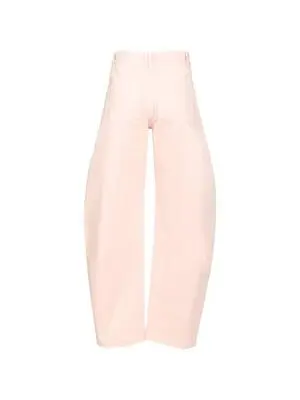 Alaïa Curved Dyed Denim Jeans