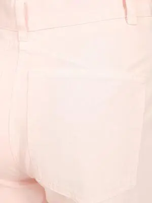 Alaïa Curved Dyed Denim Jeans