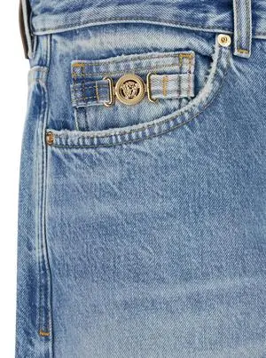 Versace Light Blue Jeans With Logo Patch On The Back And Faded Effect In Denim For