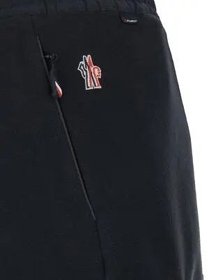 Moncler Black Pants With Side Logo Patch And Tech Fabric Inserts In Fleece